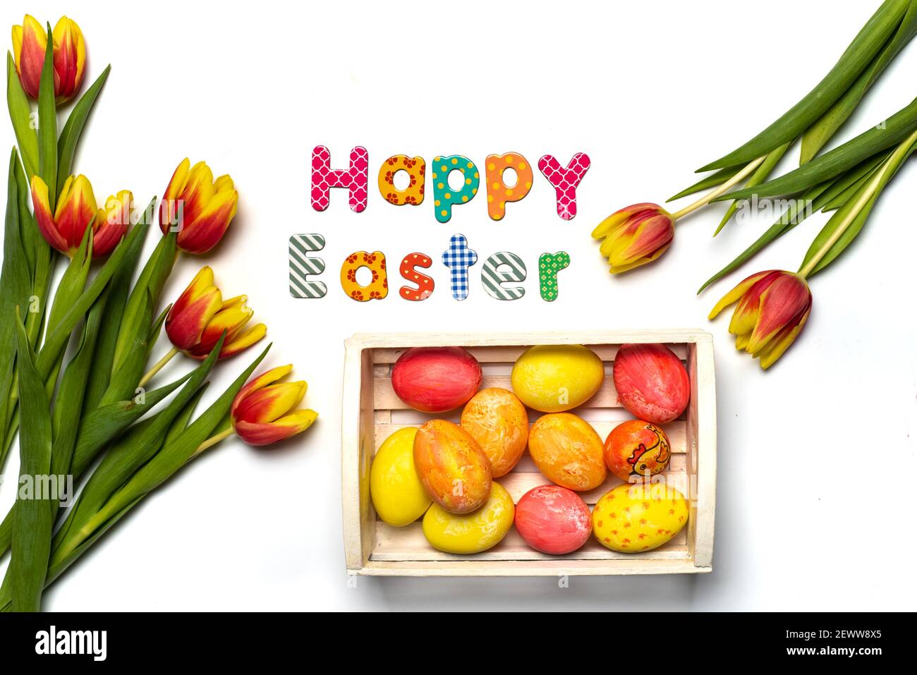 Happy Easter card with painted Easter eggs red and yellow two colored ...