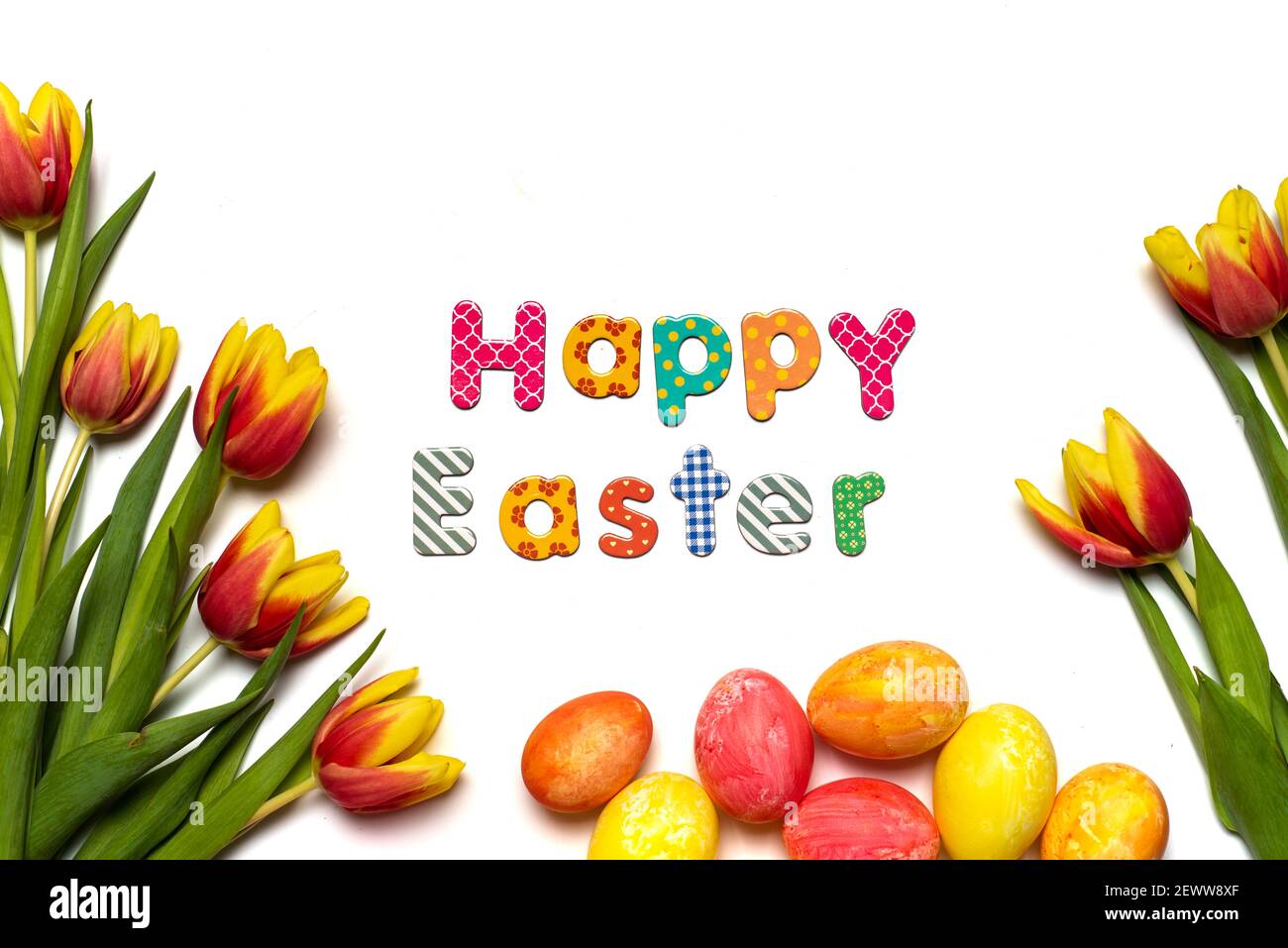 Happy Easter card with painted Easter eggs red and yellow two colored ...
