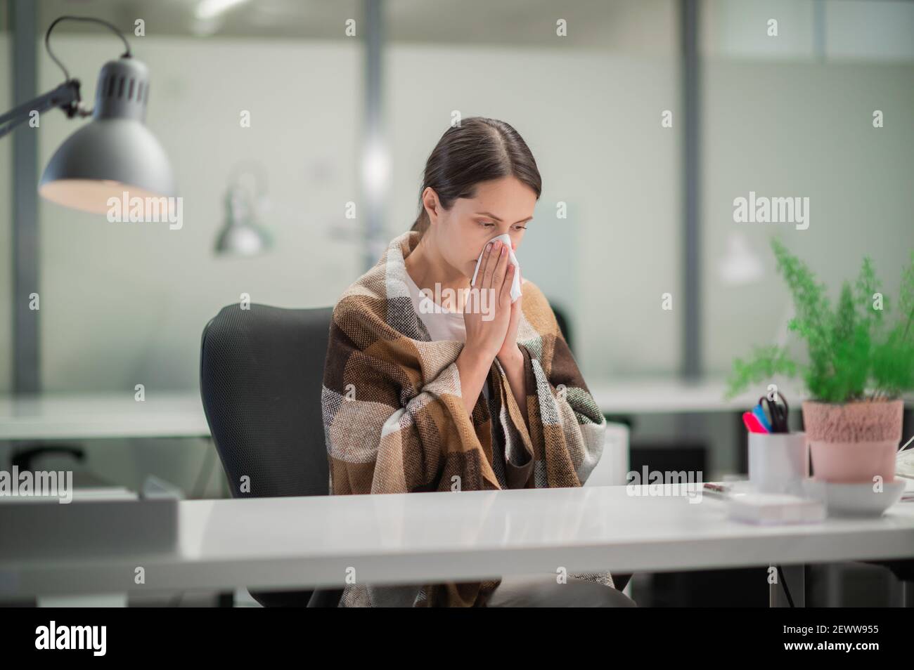 While working in the office, a female employee felt symptoms of an ...