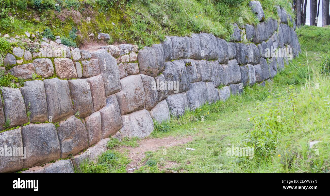 Stone wall inca masonry in sacsayhuaman complex at qenqo, cusco Peru ...