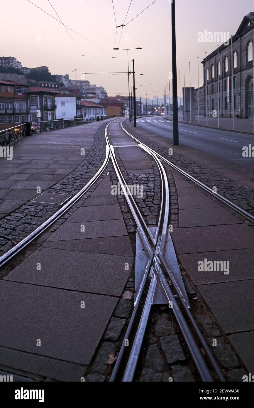 City tram rails. Oporto at dawn Stock Photo - Alamy