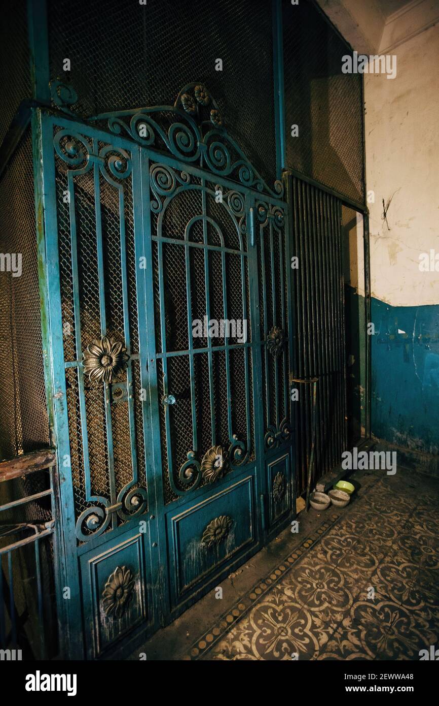 Old vintage rusty elevator gates in old mansion Stock Photo - Alamy