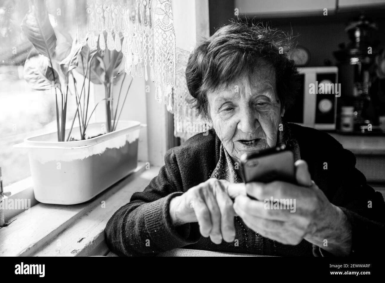 Elderly care home sitting chair Black and White Stock Photos & Images ...