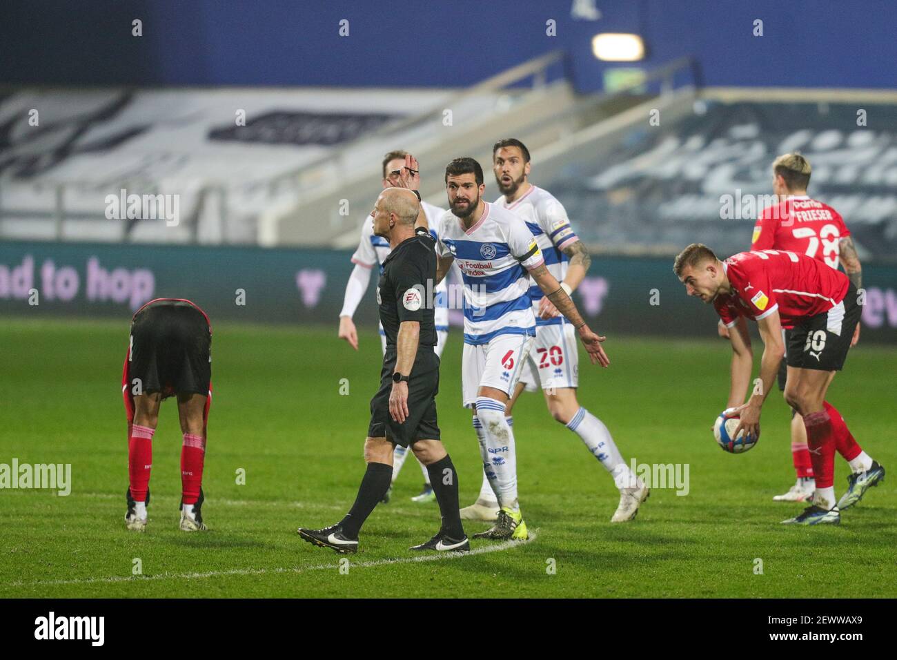 LONDON, ENGLAND. MARCH 3RD. QPRs Yoann Barbet and Geoff Cameron appeal ...