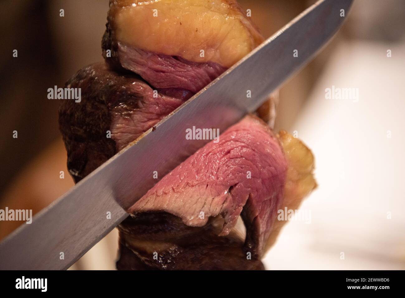 Rare steak cut in half Stock Photo - Alamy