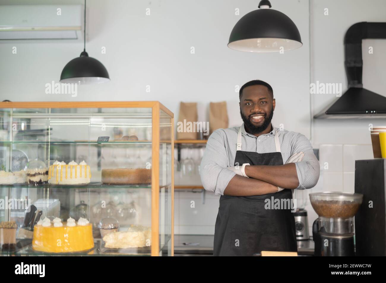 Smiling and friendly African-American small business owner, cafe ...