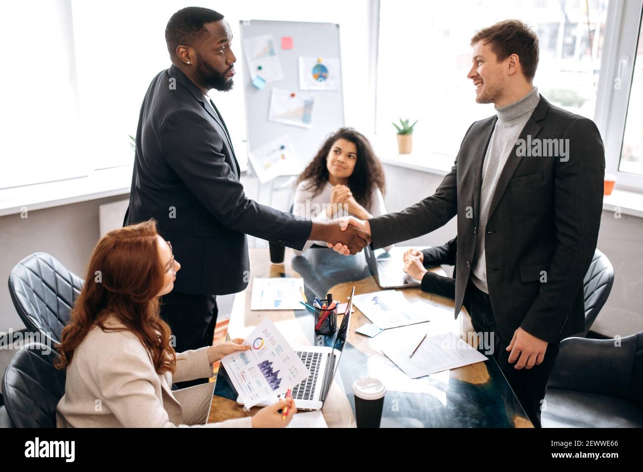 Business agreement, partnership. Successful people make agreement after ... Business agreement, partnership. Successful people make agreement after ...