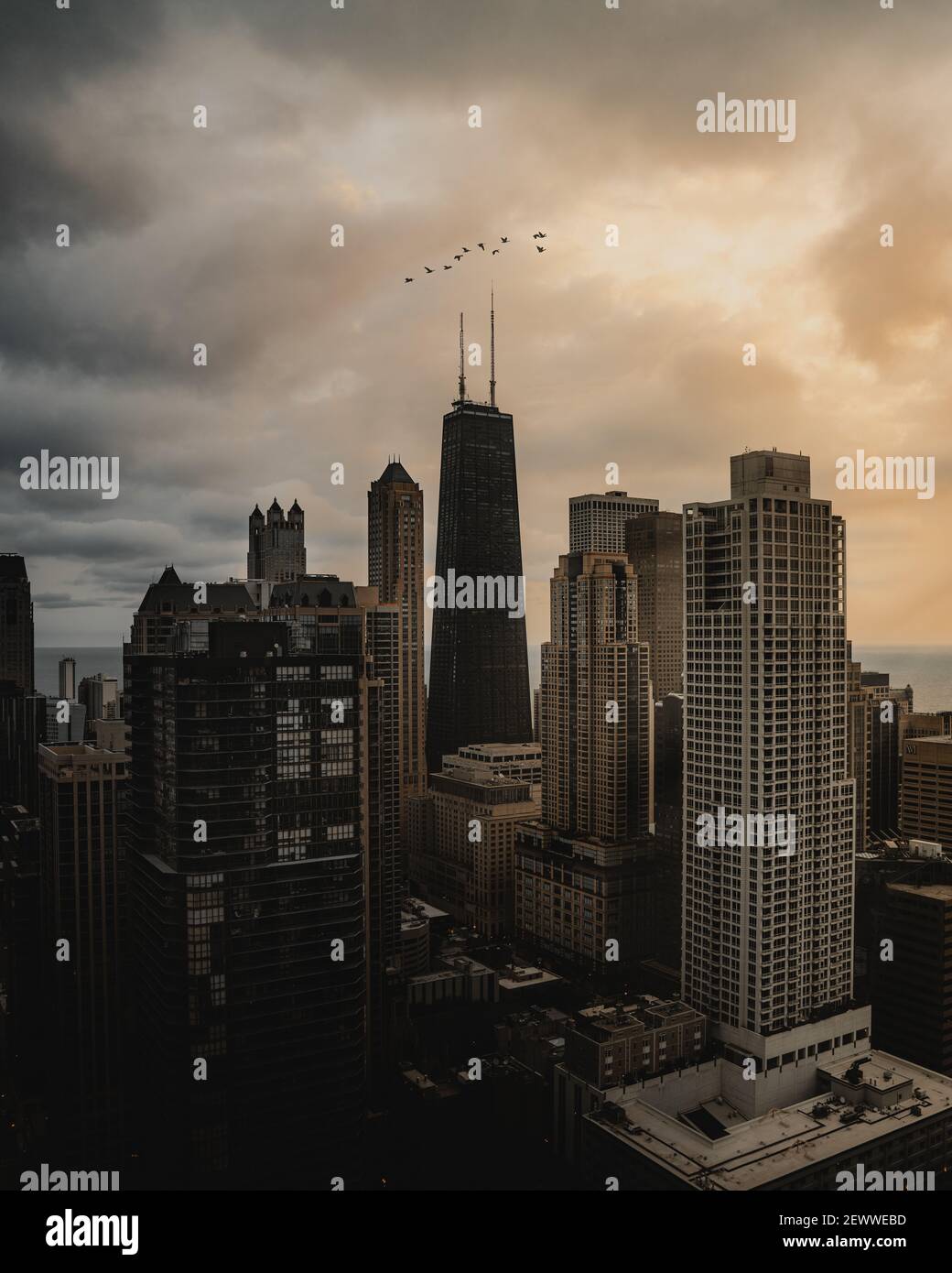 The modern tall buildings and unique skyscrapers against the cloudy sky ...