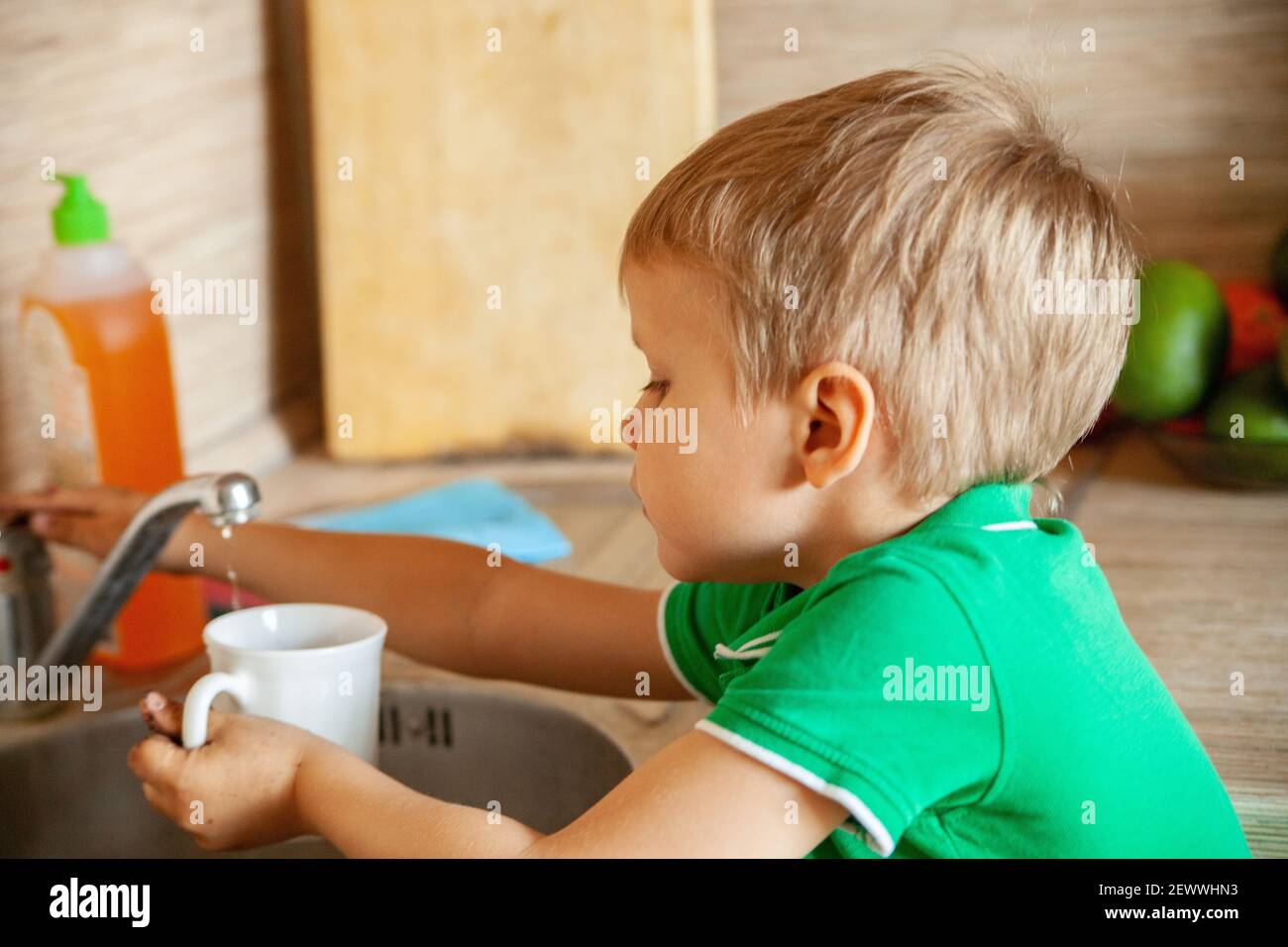 Kid water from sink hi-res stock photography and images - Alamy