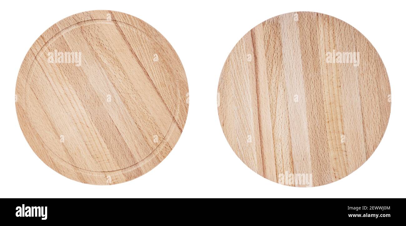 Two large wooden round cutting boards of light hardwood isolated on ...