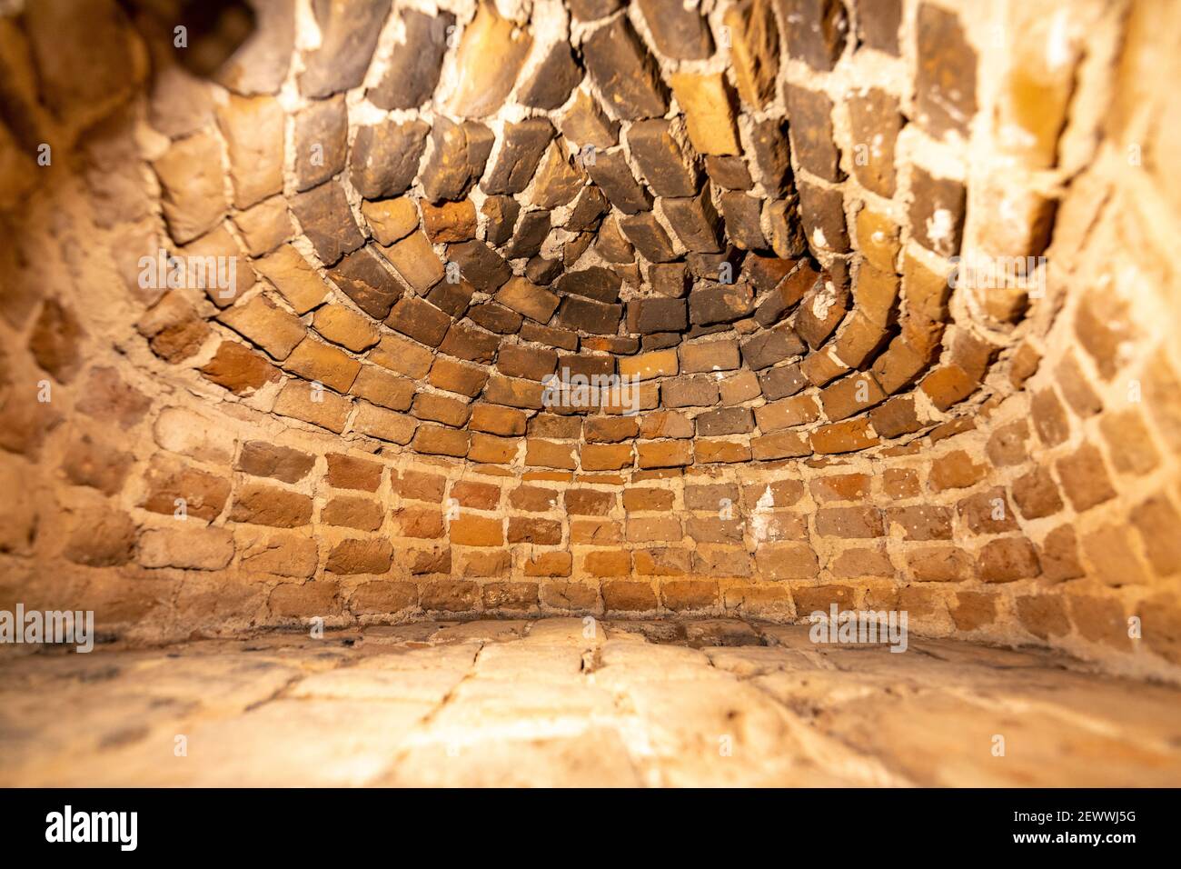 Old brick vault in a medieval wall. A historic hiding place in a ...