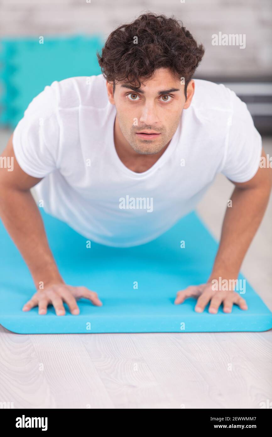 man doing plank exercise at home Stock Photo - Alamy