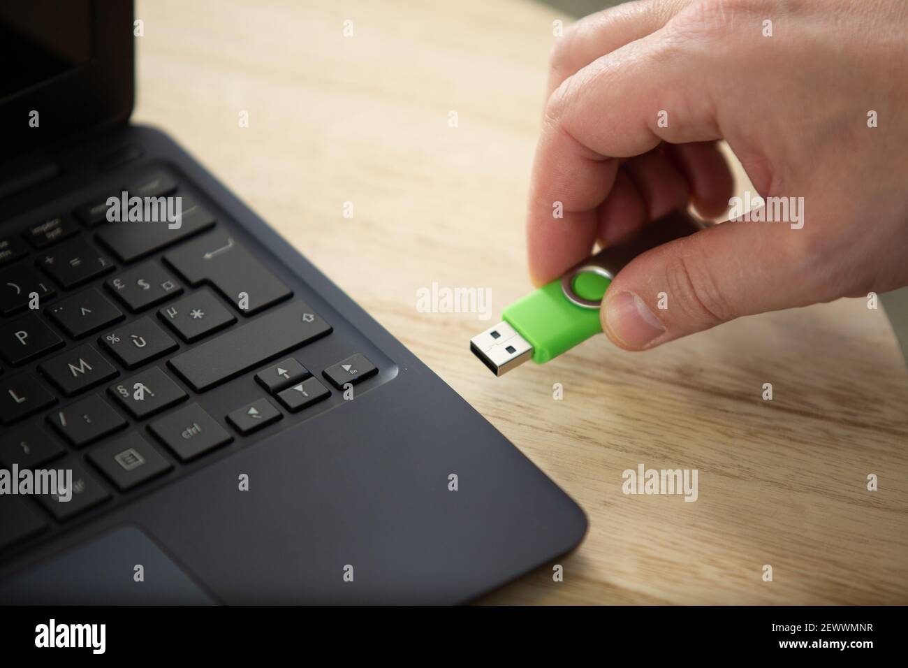 closeup stick usb into laptop Stock Photo - Alamy