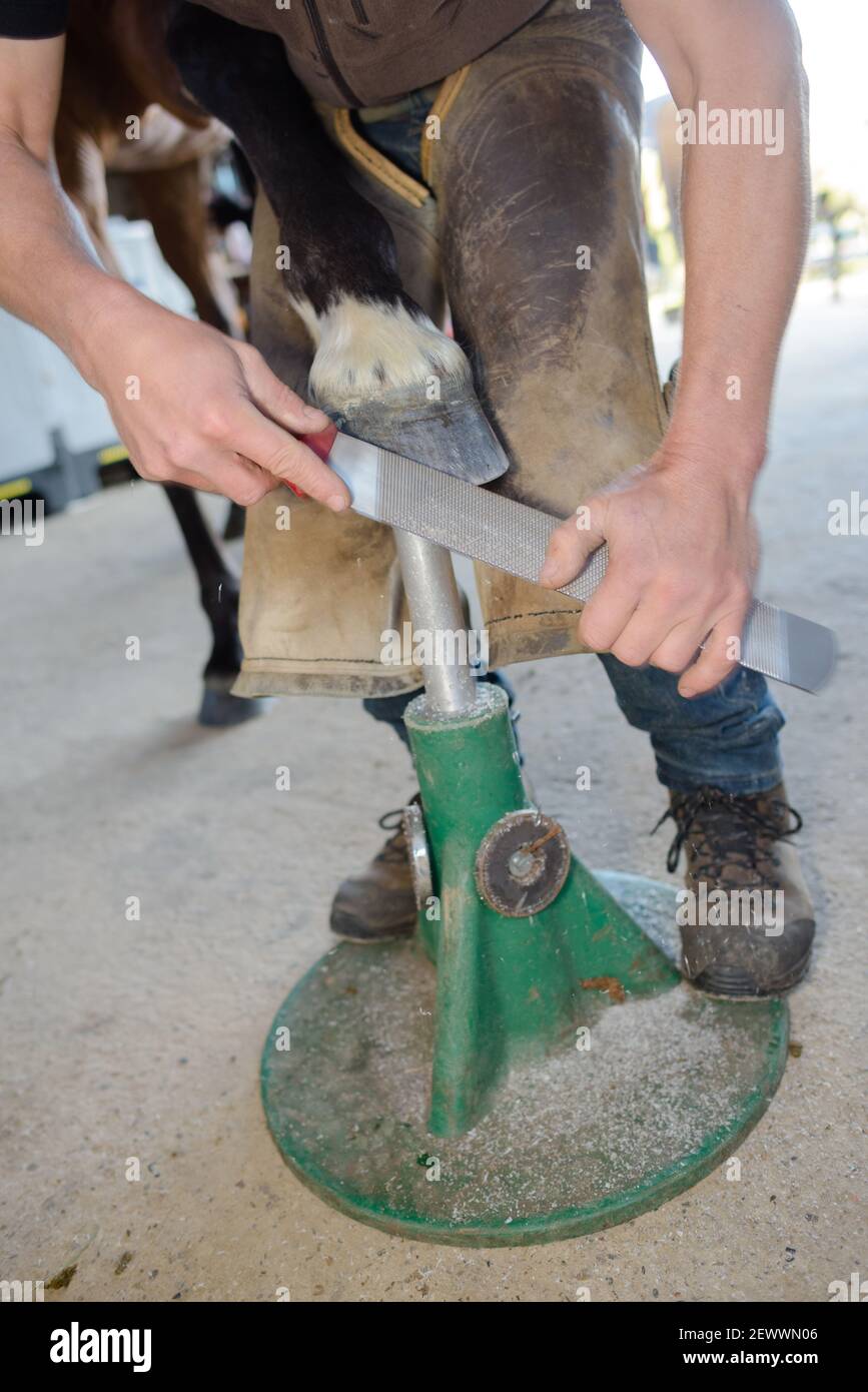man working hard stone with its outdoor tools Stock Photo - Alamy