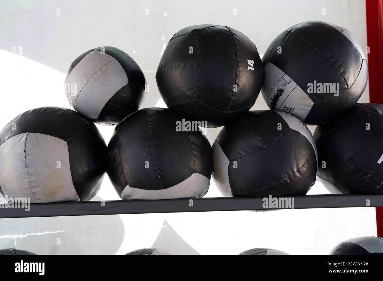 Group of medicine balls stuck on each other Stock Photo - Alamy