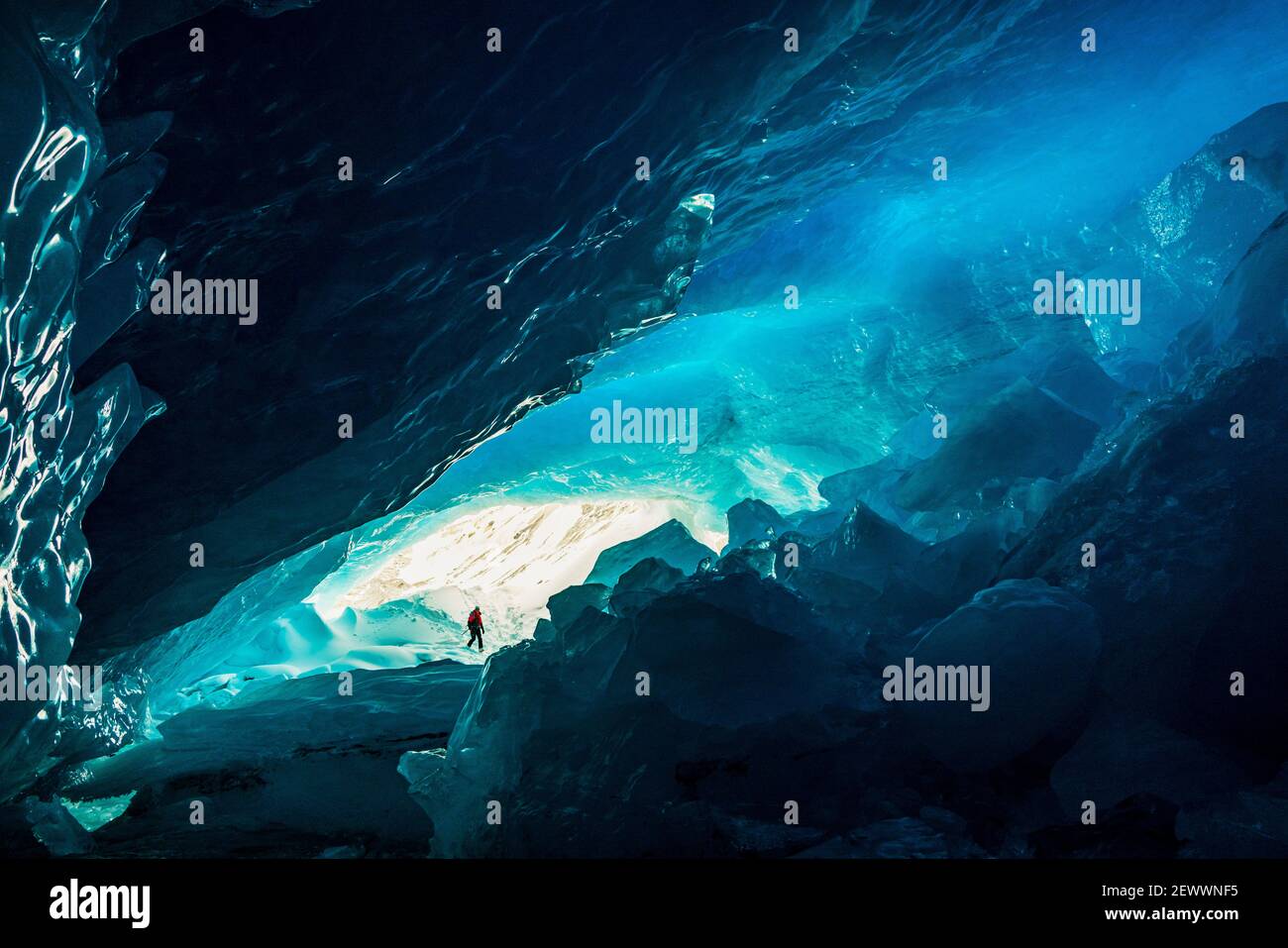 Exploring Glacial Ice Cave Inside Banff National Park Stock Photo - Alamy