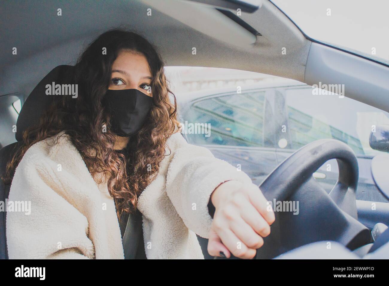 young woman driving with protective mask Stock Photo - Alamy young woman driving with protective mask Stock Photo - Alamy