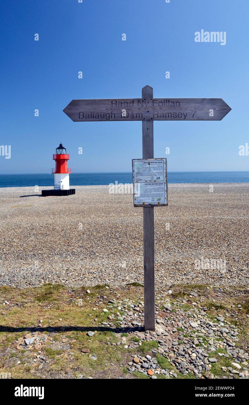 point of ayre lighthouse, beach and road sign isle of man Stock Photo ...