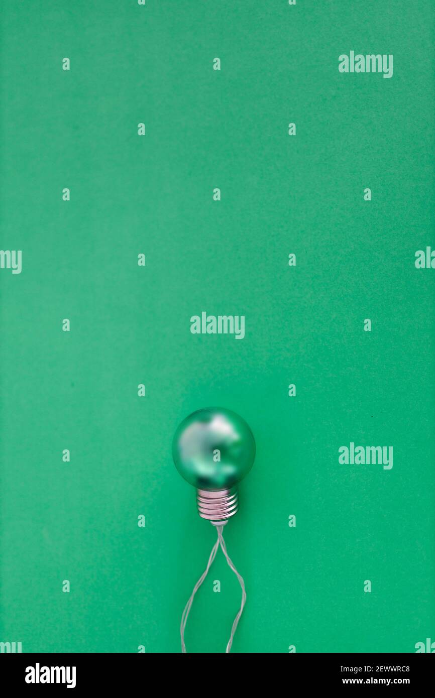 colorful green light bulb symbol of creativity and ideas on tone on ...