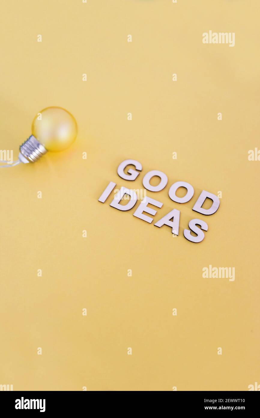 colorful yellow light bulb symbol of creativity and ideas on tone on ...