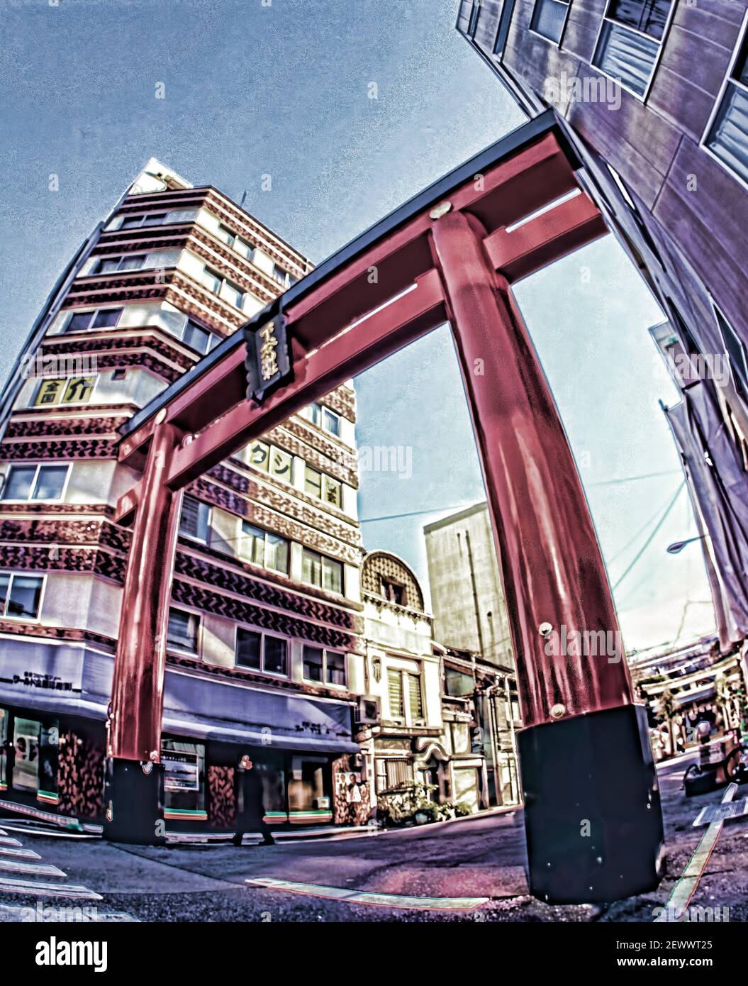 Torii gates on a busy modern city street, Asakusa, Tokyo Stock Photo ...