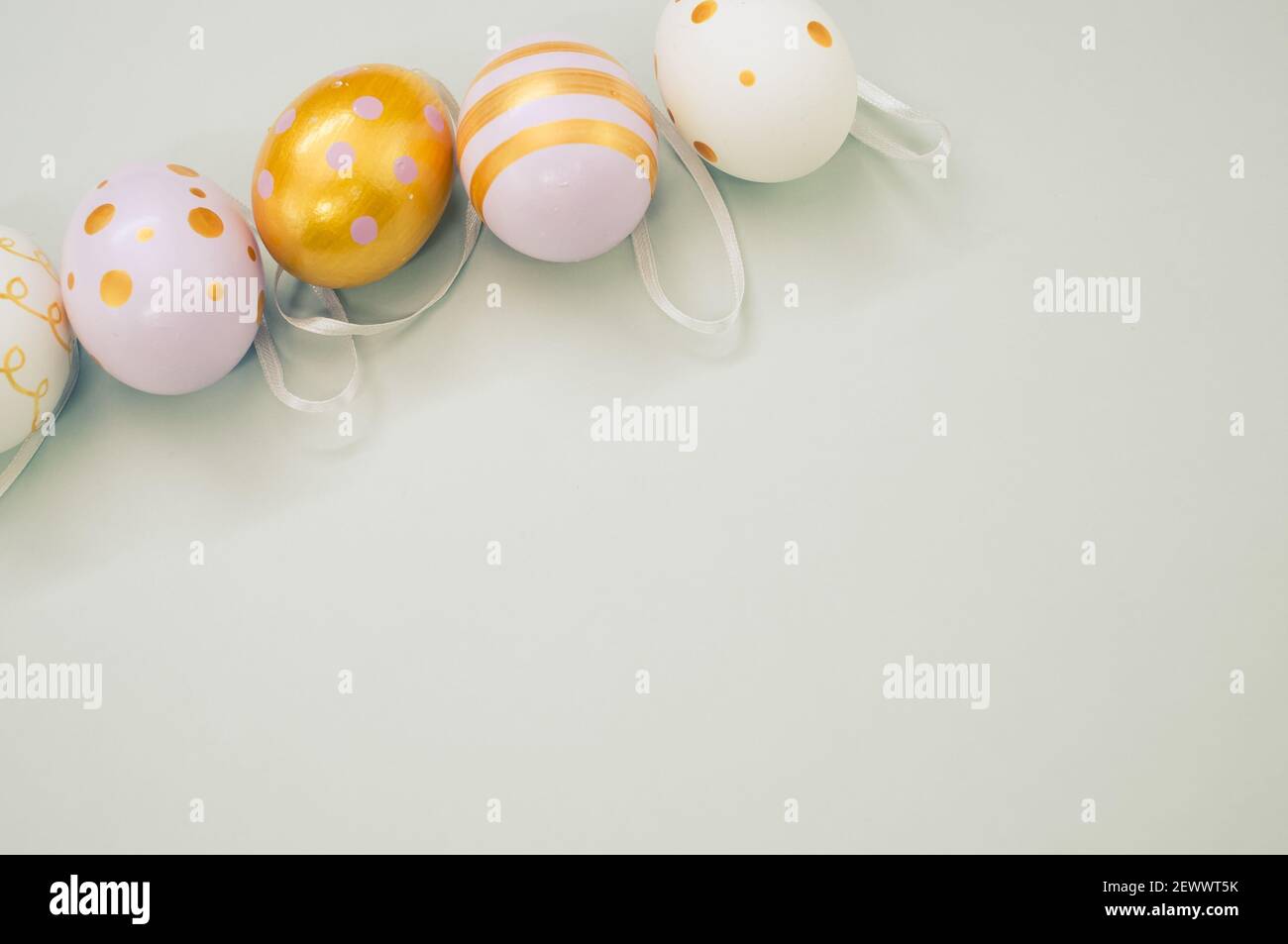 A high angle shot of decorated eggs for Easter on a gray surface Stock ...