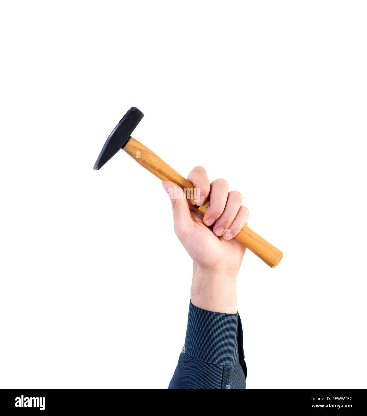 A man's arm raised holding a hammer isolated on white background Stock ...