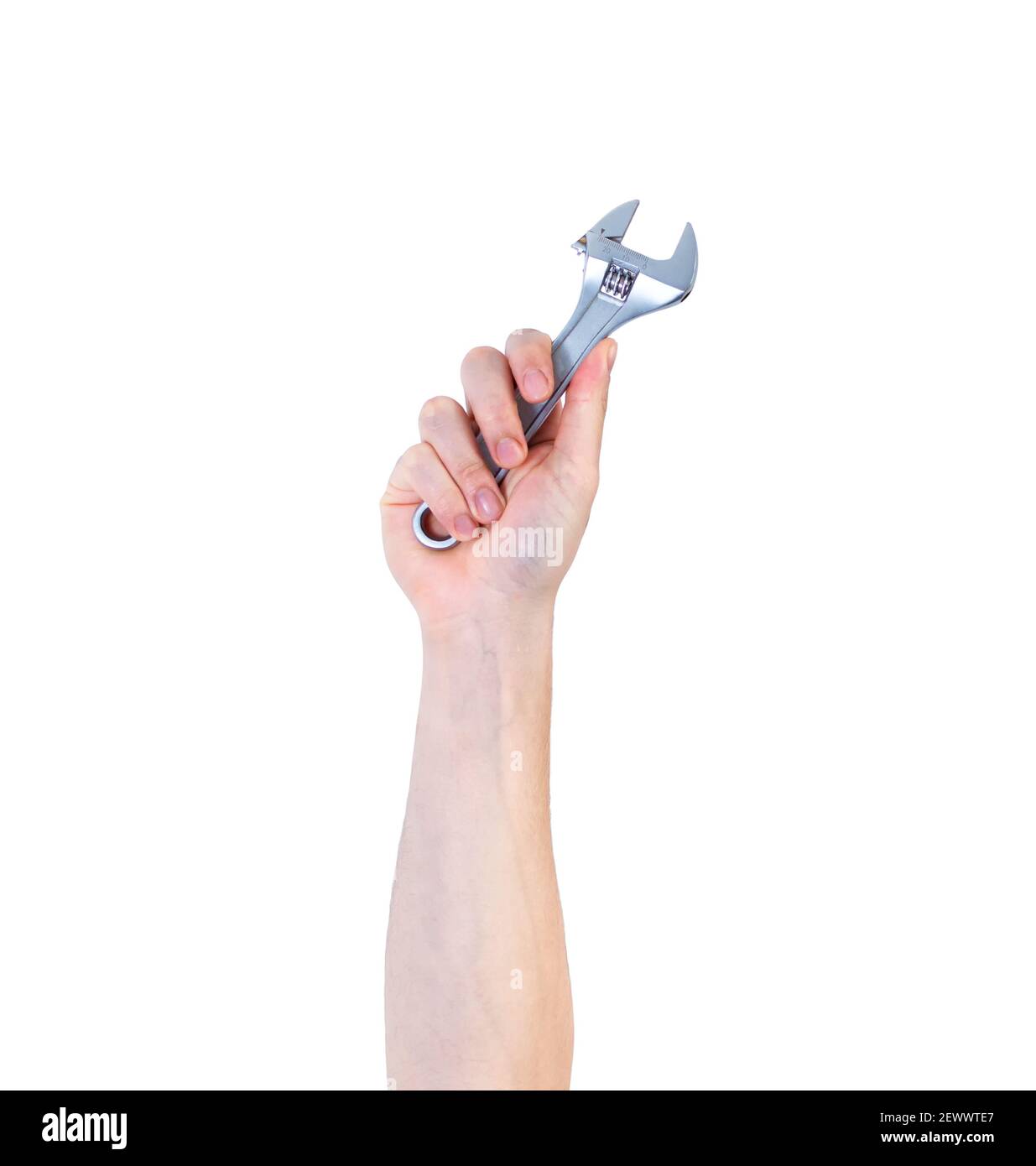 A man's arm raised holding an adjustable spanner Stock Photo - Alamy