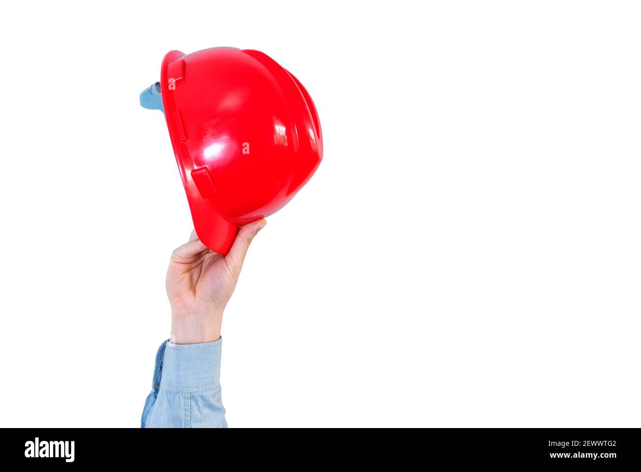 A man's arm raised holding a helmet isolated on white background Stock ...