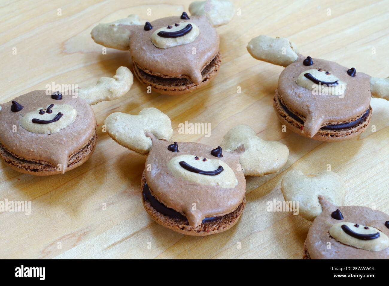 Cute macaron cookies shaped like a moose head with antlers filled with ...