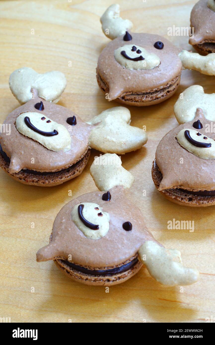 Cute macaron cookies shaped like a moose head with antlers filled with ...