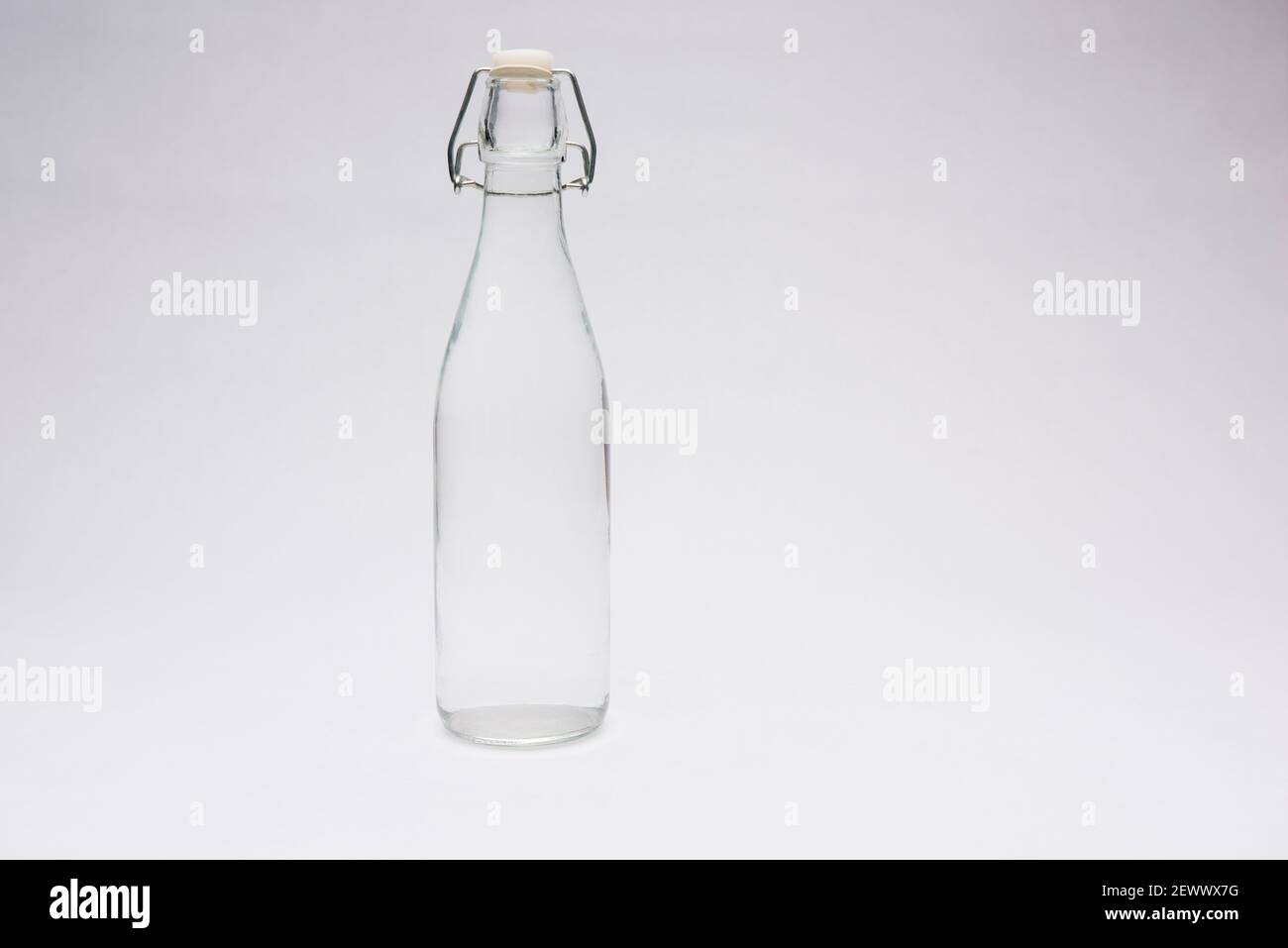 Translucent bottle of water on a white background Stock Photo - Alamy