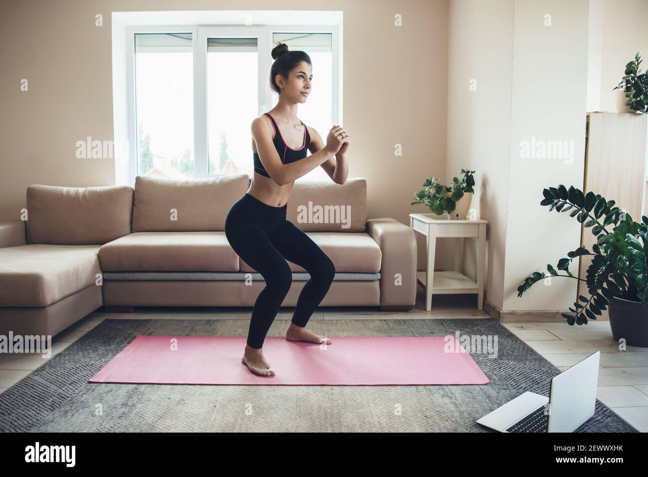 In A Squatting Position High Resolution Stock Photography and Images ...