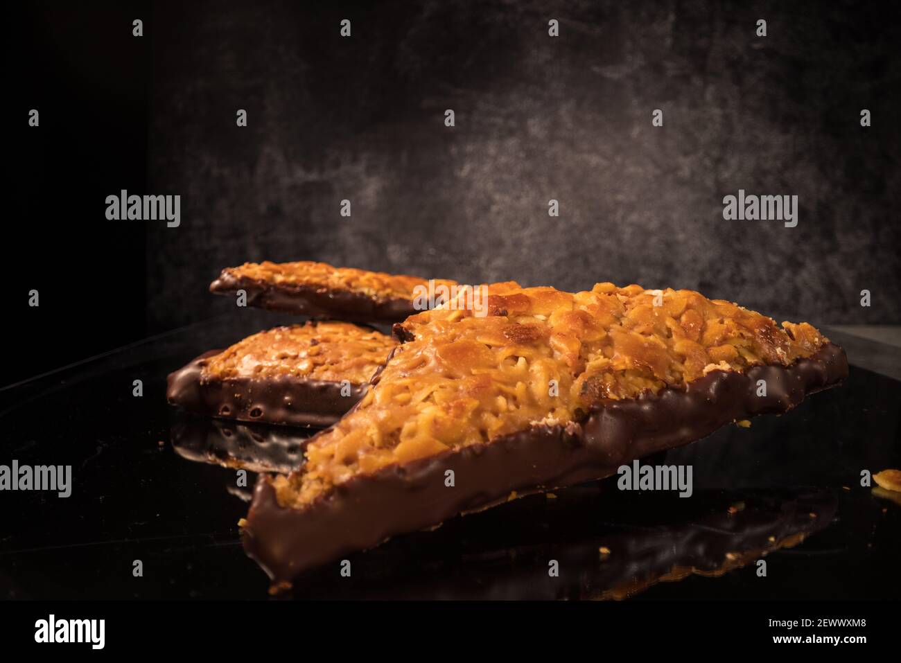 Sweet nut triangles with almonds - a German specialty Stock Photo - Alamy