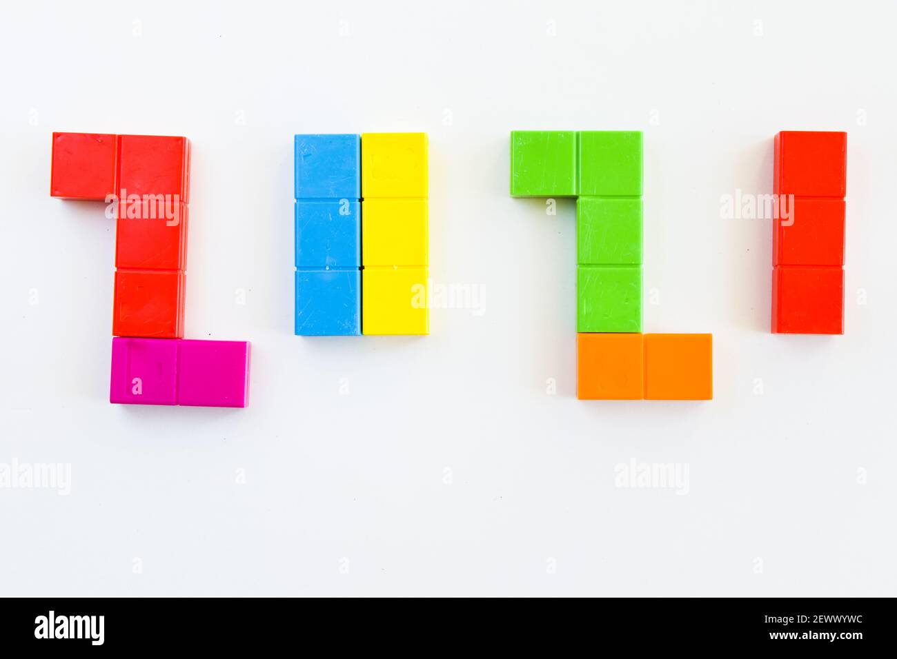 A top view of colorful puzzle cubes showing the date 2021 - geometric ...