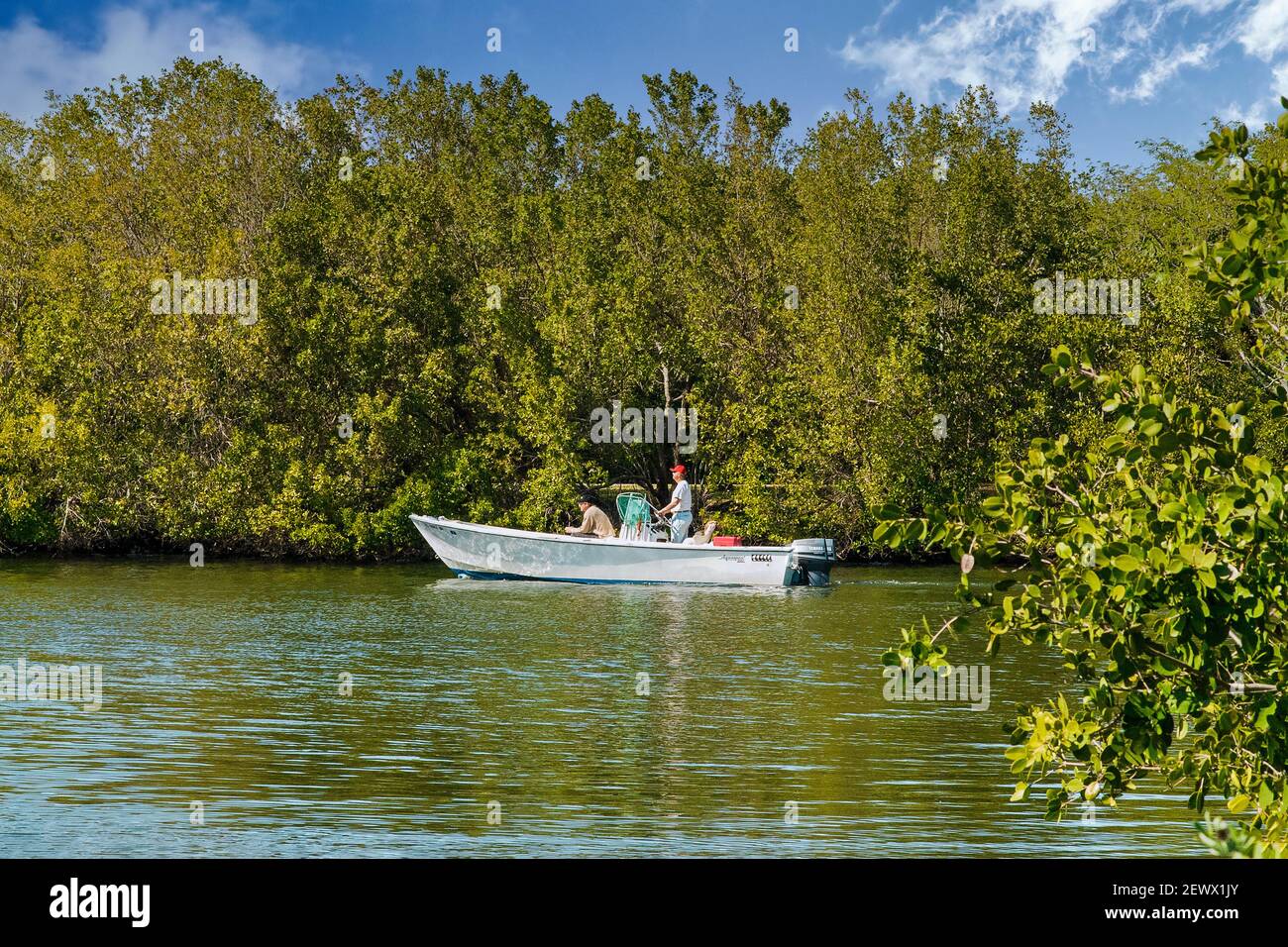 A boat with fishermen comes up the channel at the Miami-Dade Homestead ...
