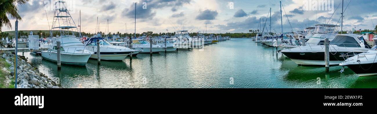 Panoramic late afternoon view of the boats docked at the Black Point ...