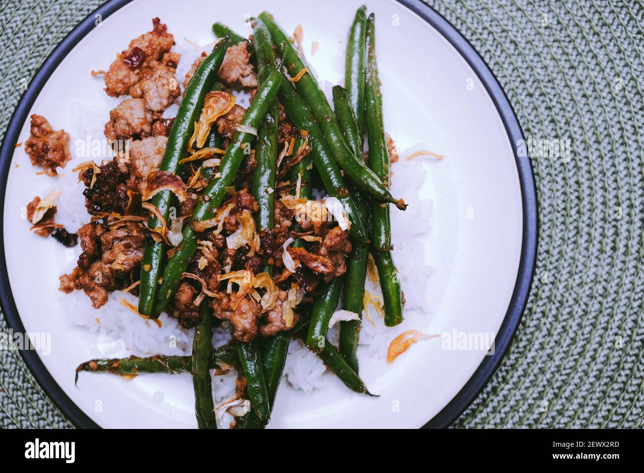 beef strip stir fry with beans and rice Stock Photo - Alamy