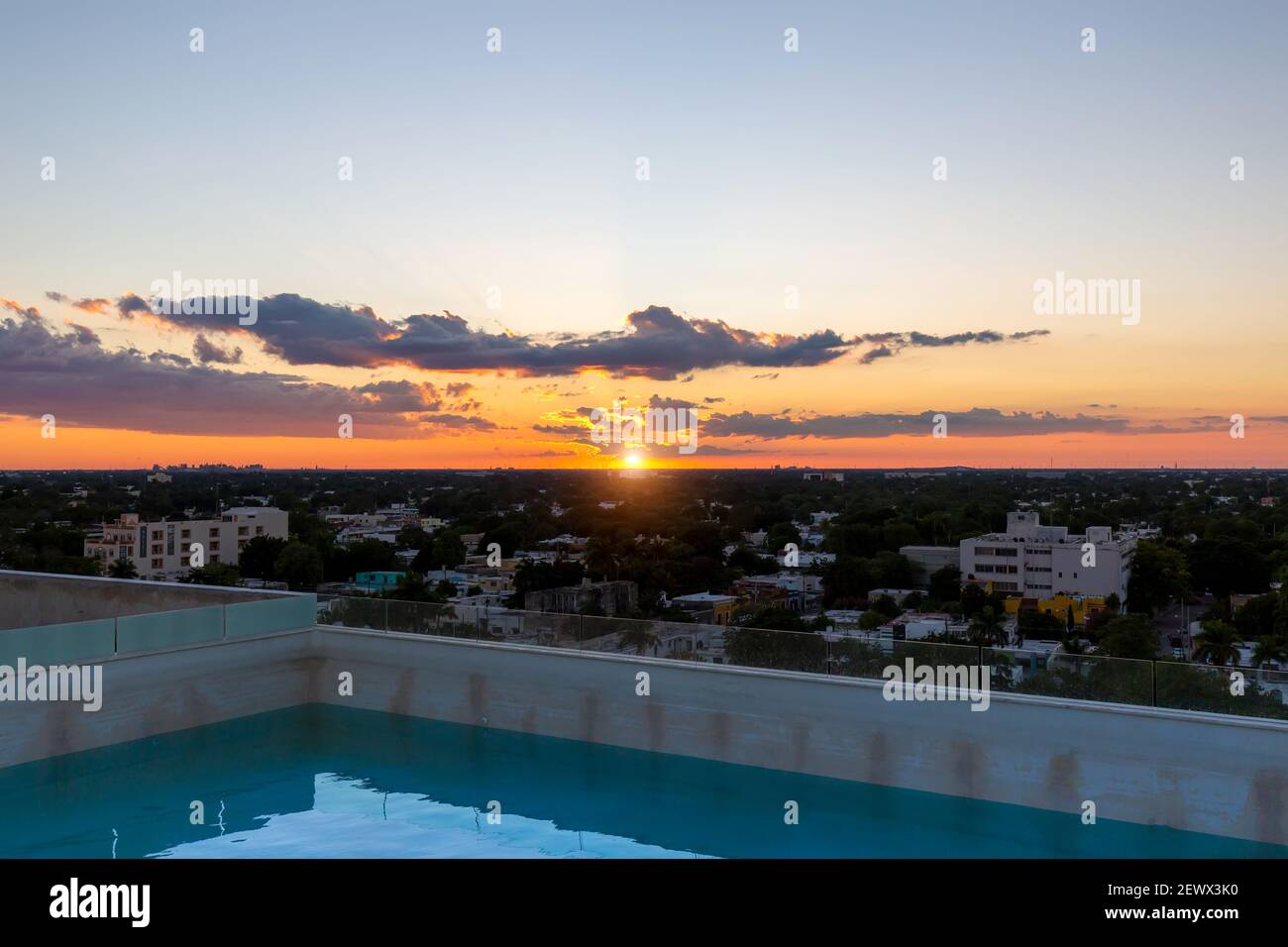 A swimming pool at the roof of the upscale hotel in Merida with scenic ...