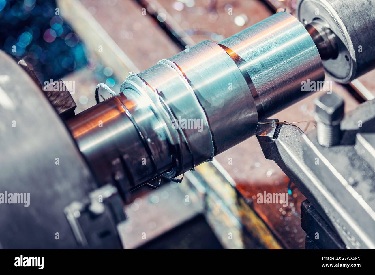 Machine iron tools CNC cut of metal with light spark, technology modern ...