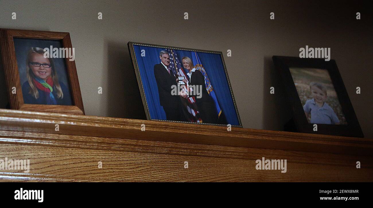 A photograph of Sylvia Hilgeman meeting with then FBI Director Robert ...