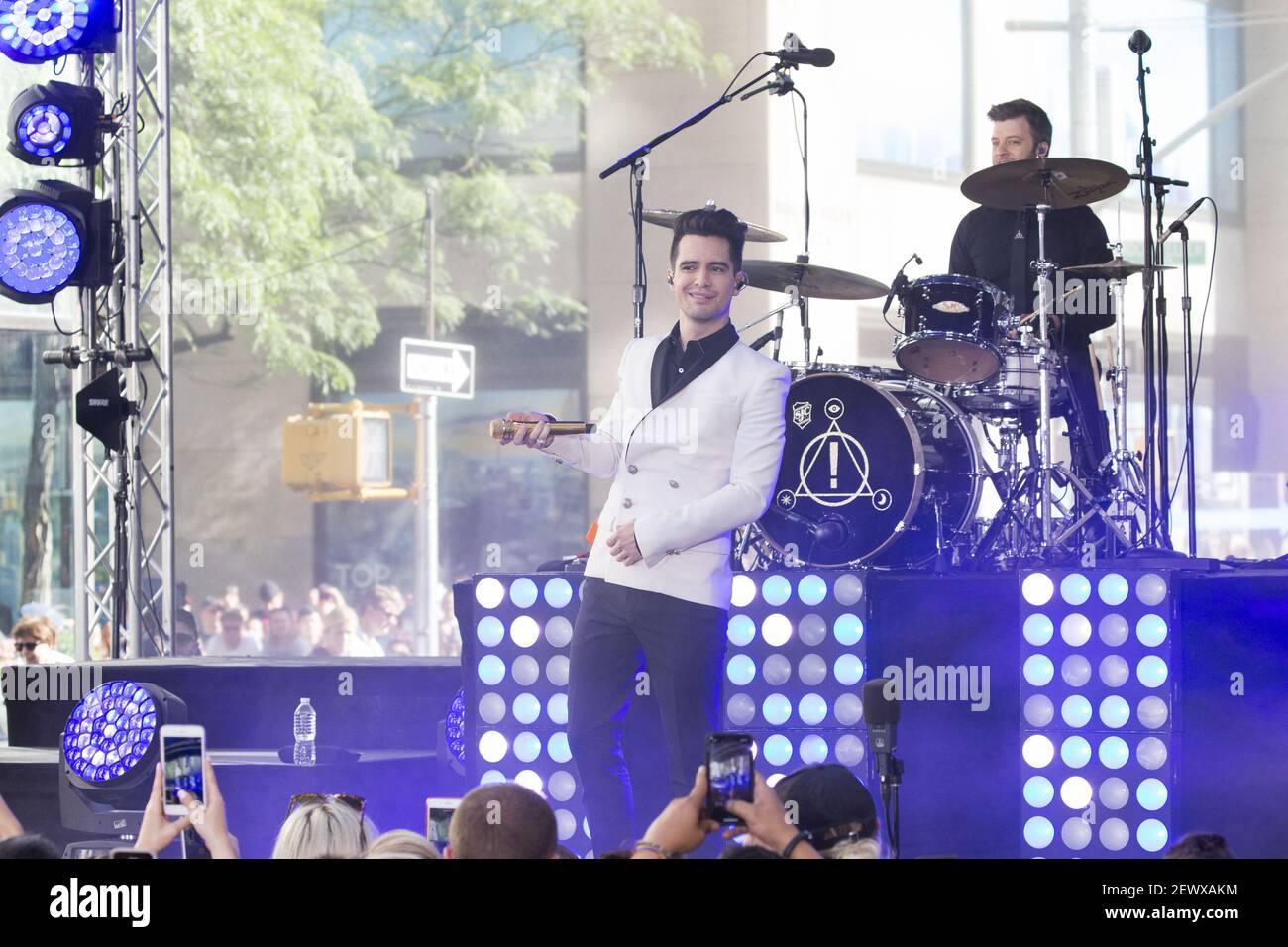 Singer Brendon Urie of Panic at the Disco and bandmembers performing on ...