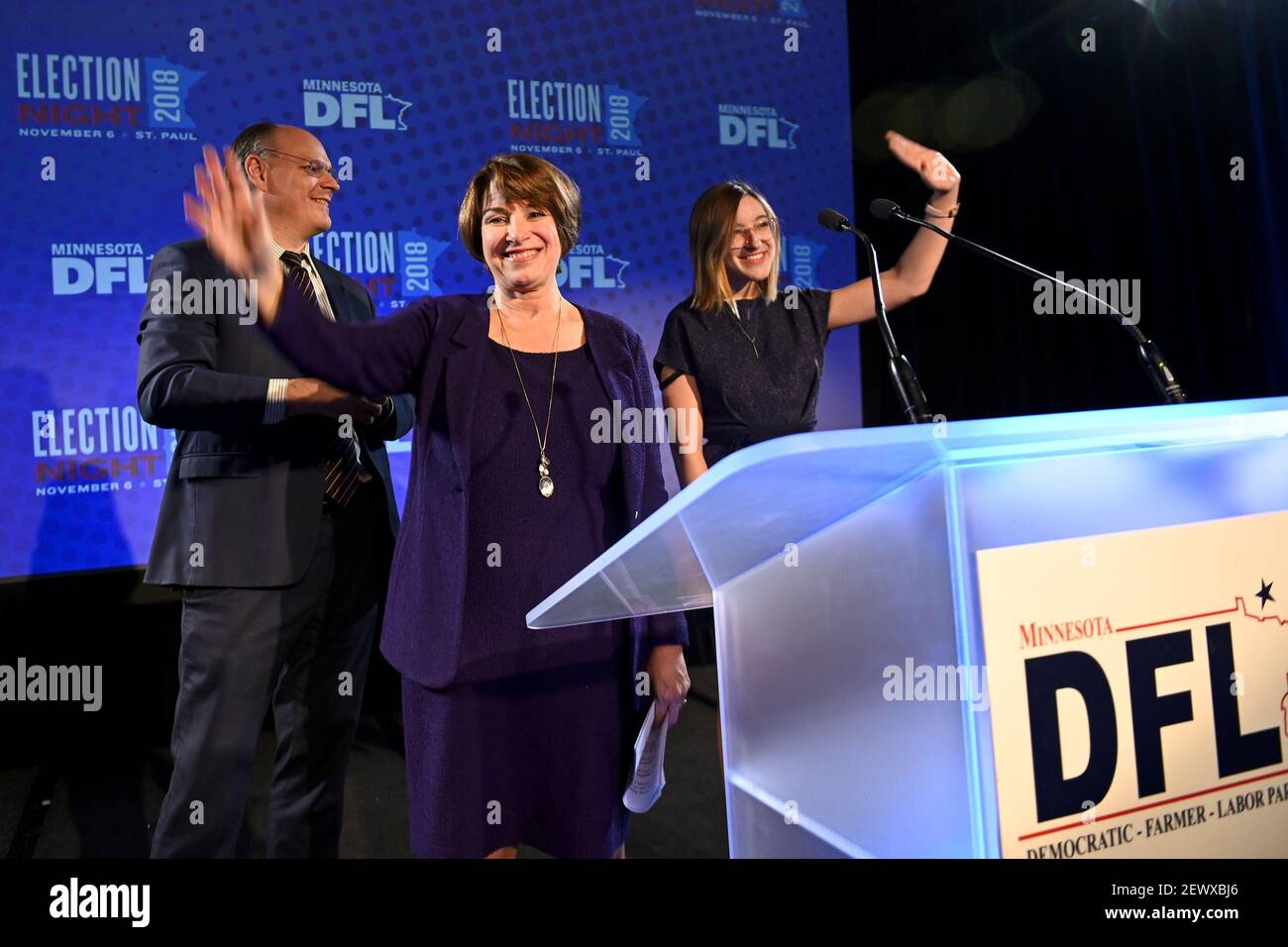 Sen. Amy Klobuchar stands beside her husband, John Bessler, and her ...