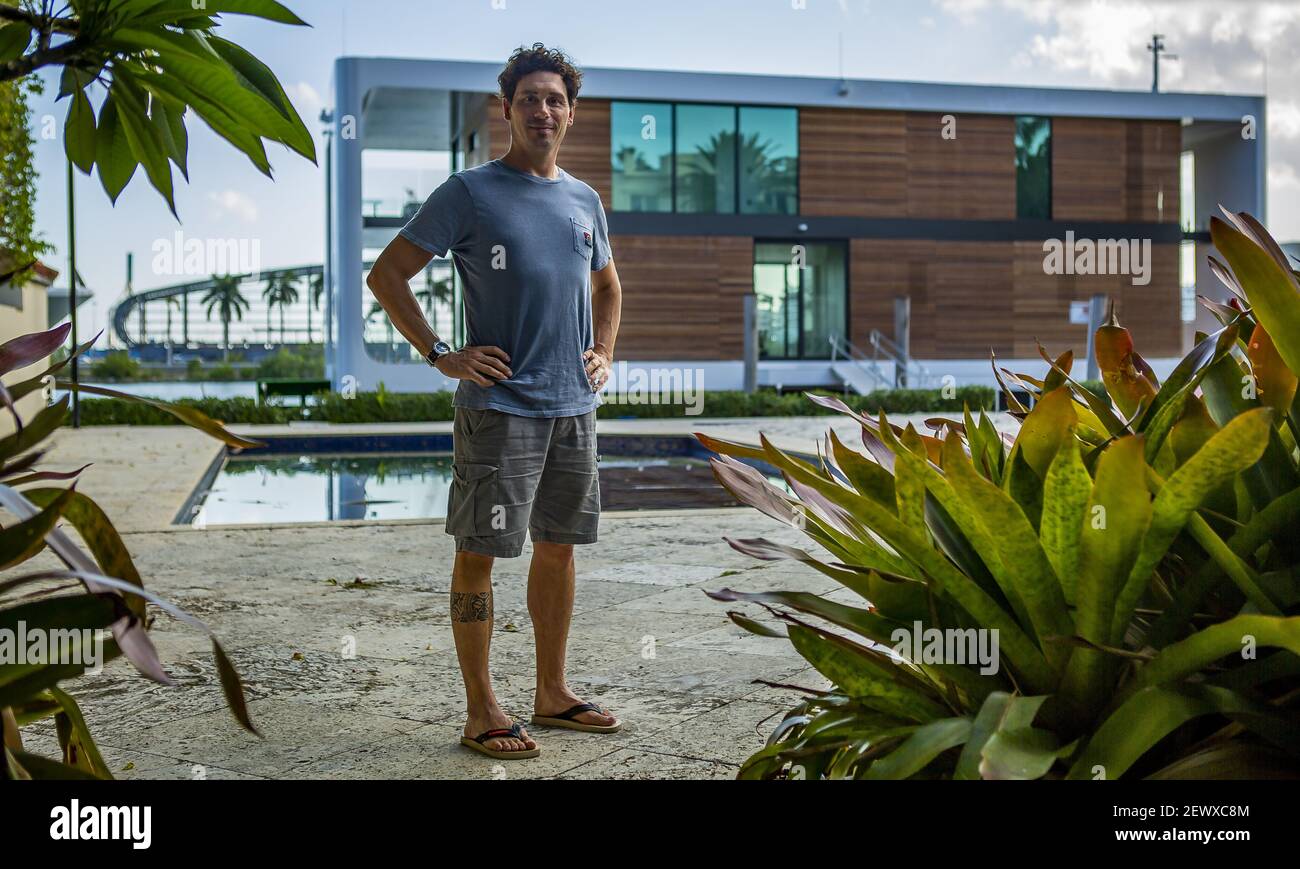 Nicolas Derouin stands in front of the Arkup houseboat, a green-energy ...