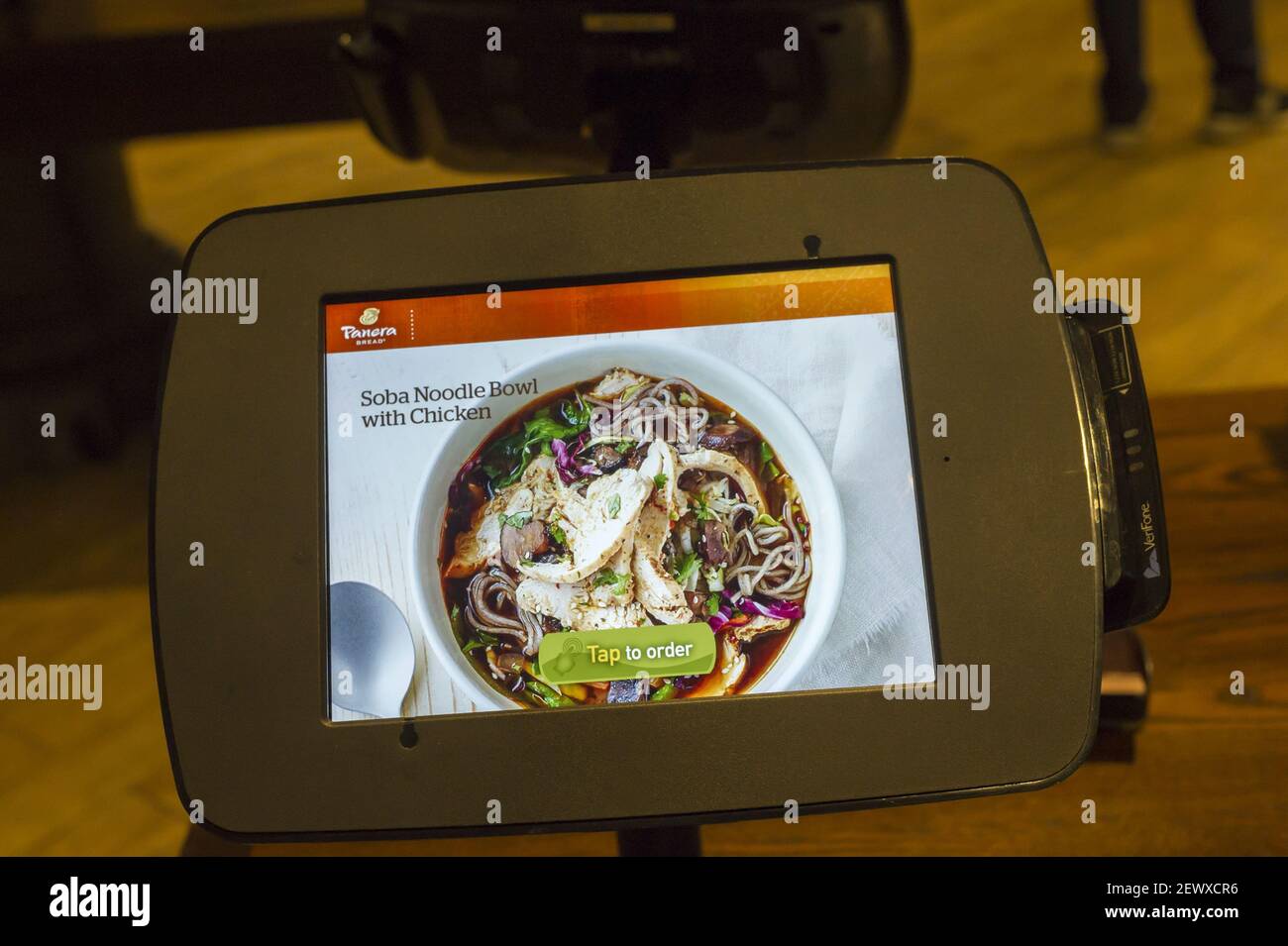 Ordering kiosks, replacing cashiers, at a Panera Bread cafe in New York ...