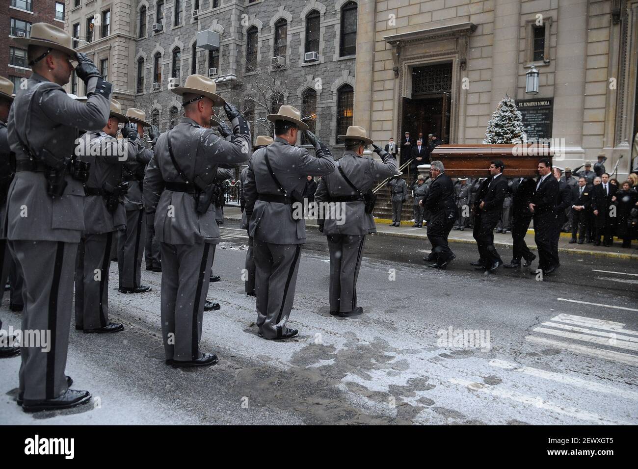 The casket carrying former New York Governor Mario Cuomo is carried out ...