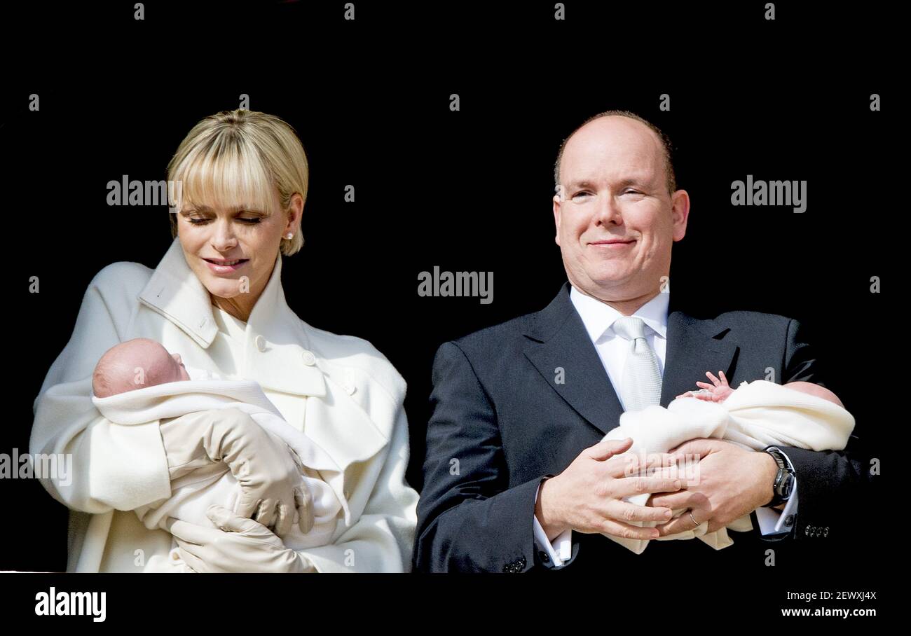 Prince Albert (R) and Princess Charlene (L) of Monaco present their ...
