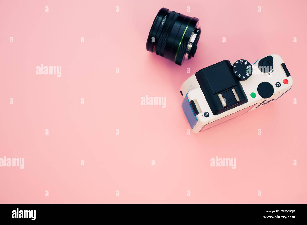 A top view of a photo camera isolated on a pink background Stock Photo ...