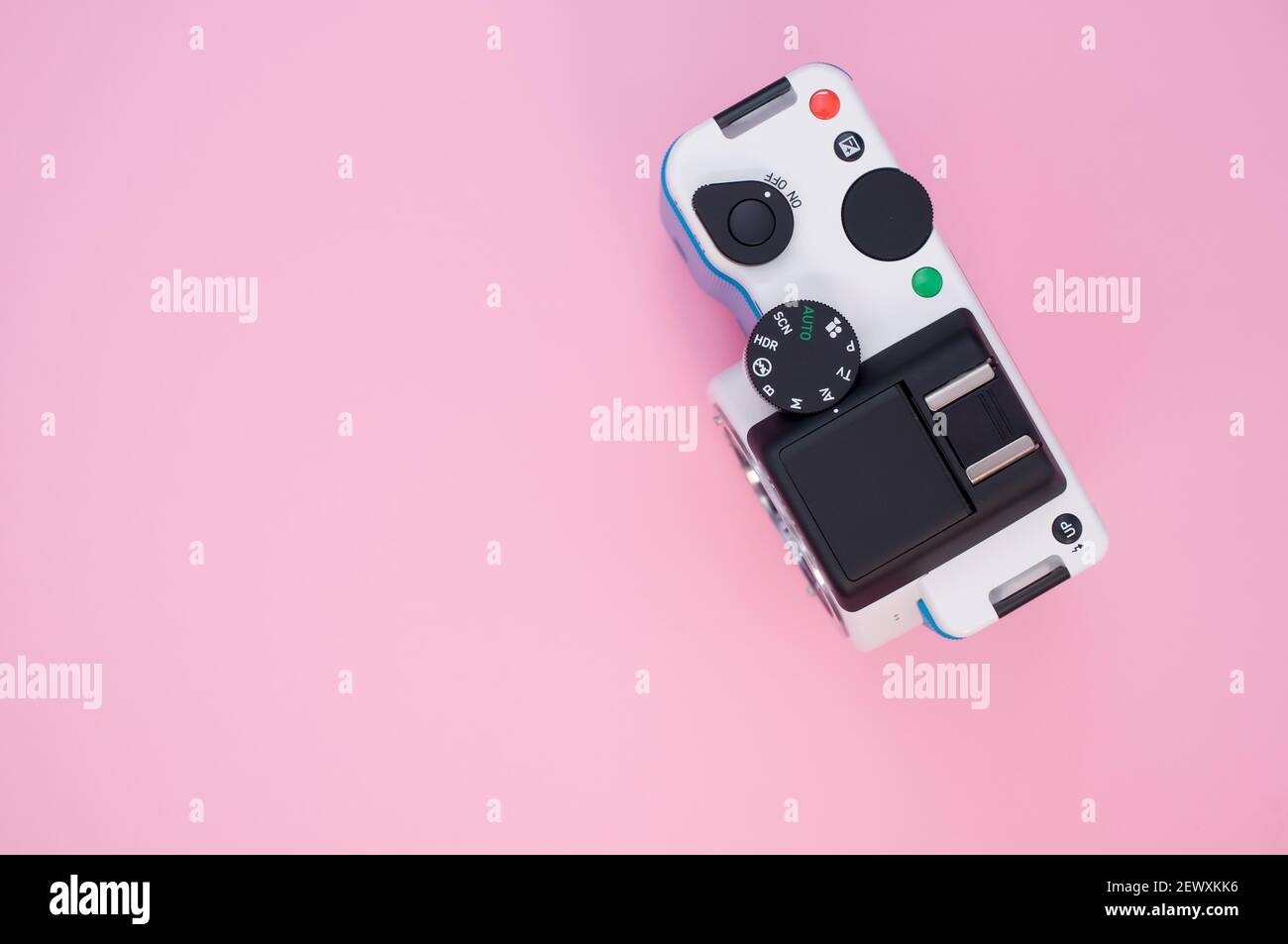 A top view of a photo camera isolated on a pink background Stock Photo ...