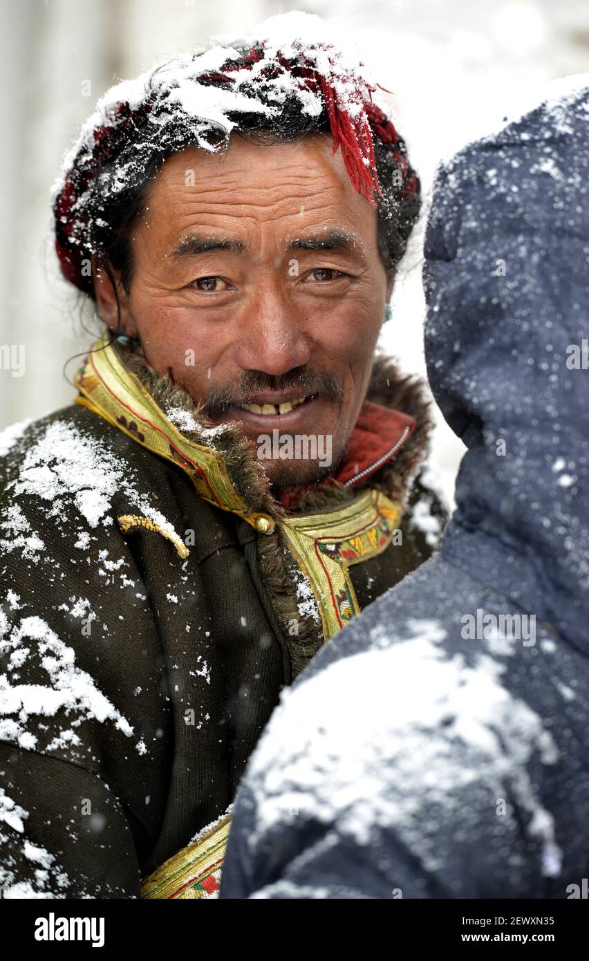 The religious people kowtowing in front of Jokhang Temple to welcome ...